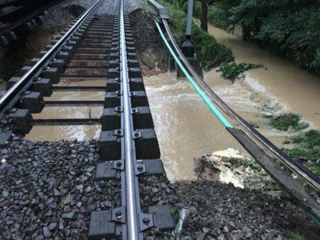 Seven injured as Paris train derails following embankment collapse ...