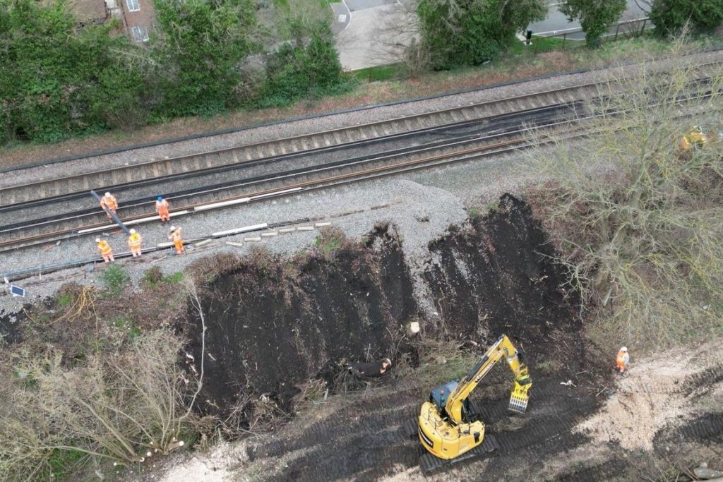 Kent railway embankment stabilised after landslide following rain ...
