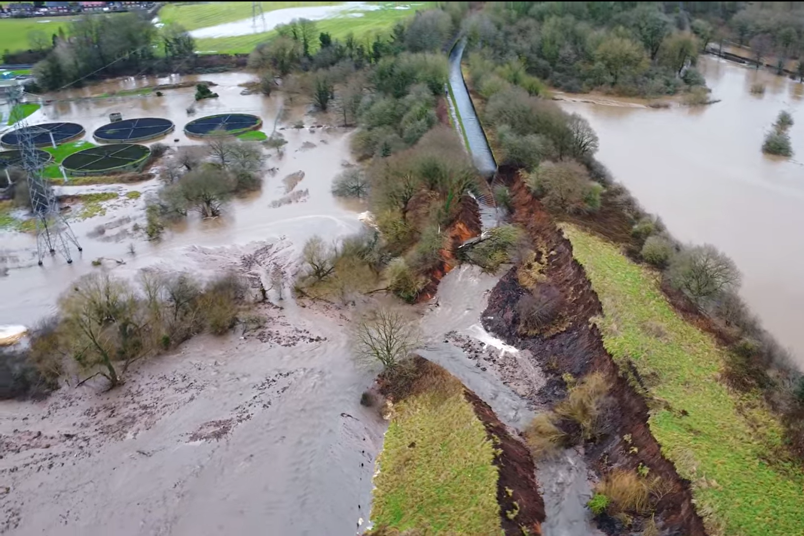 Bridgewater Canal bursts following heavy rainfall across North West ...