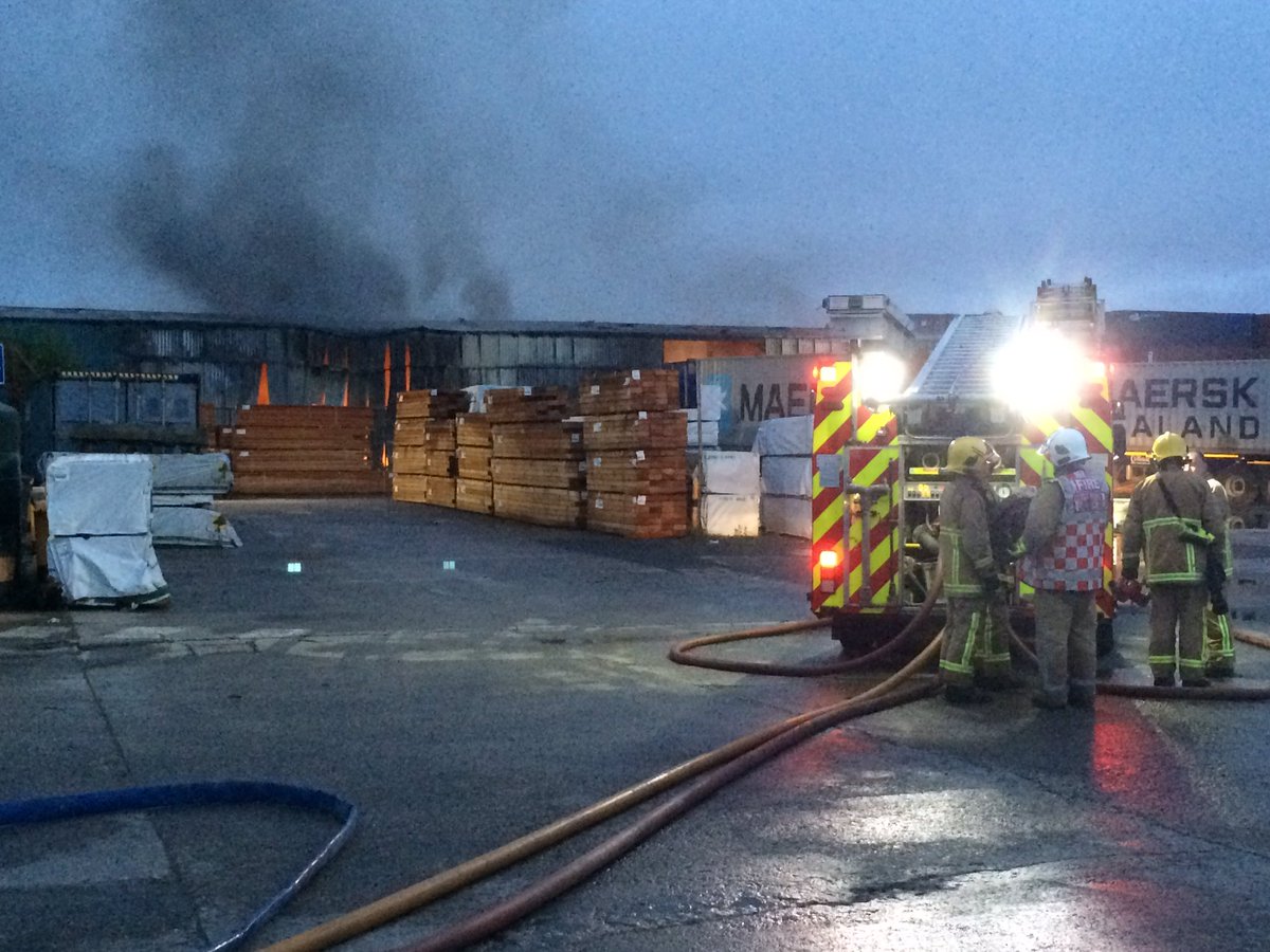 Crews damping down waste site fire | MRW