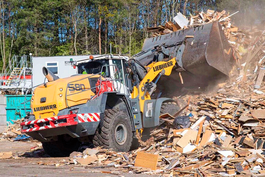 Loader moves waste wood | MRW