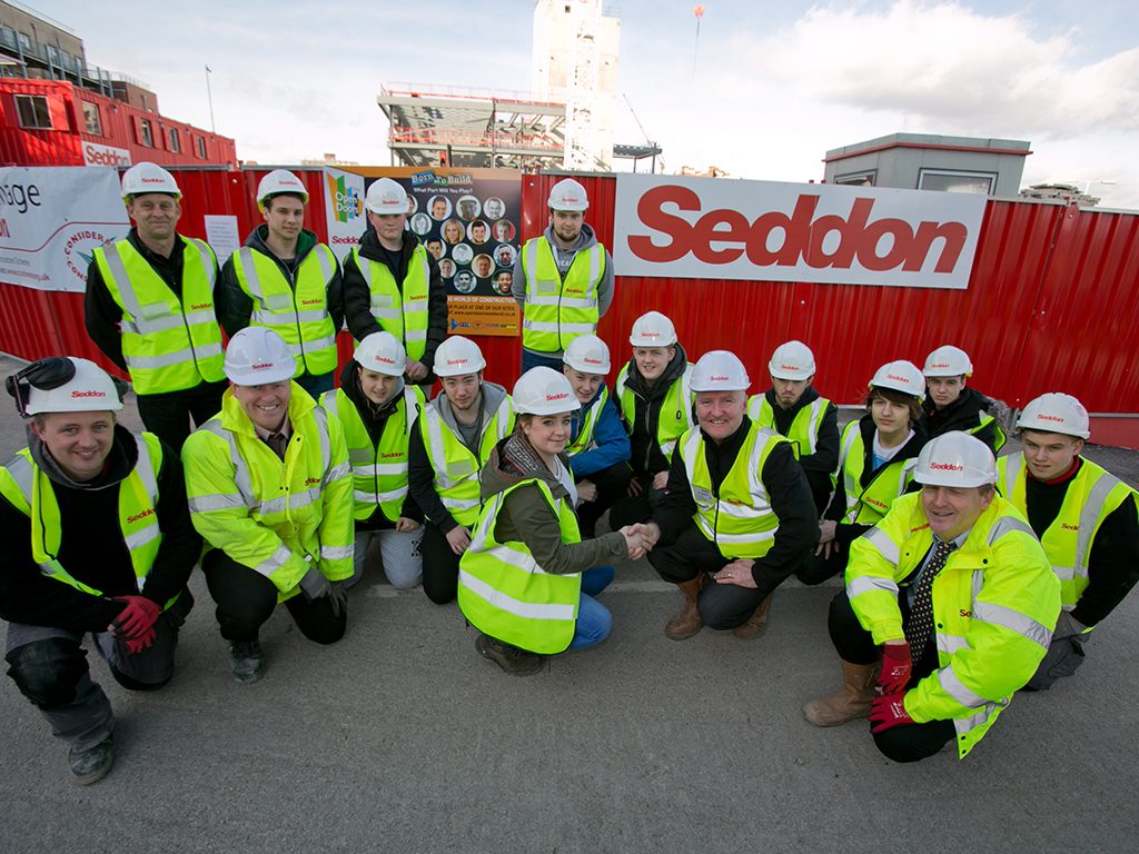 Budding builders get behind the hoardings at Seddon's Chester site ...