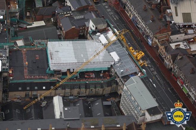 Homes evacuated after crane collapses in Reading town centre ...