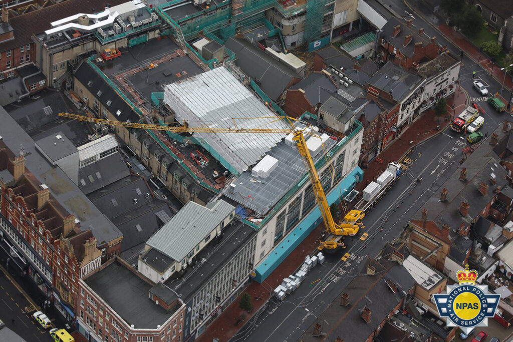 Homes evacuated after crane collapses in Reading town centre ...