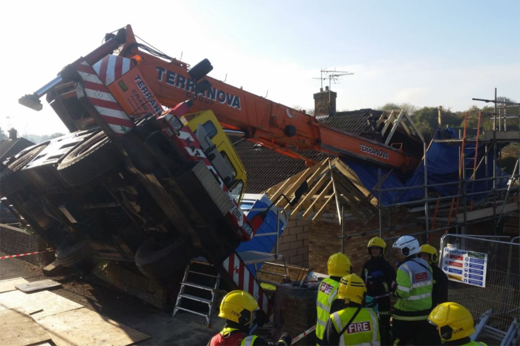 Man rescued after 27-tonne crane collapses on house | Construction News