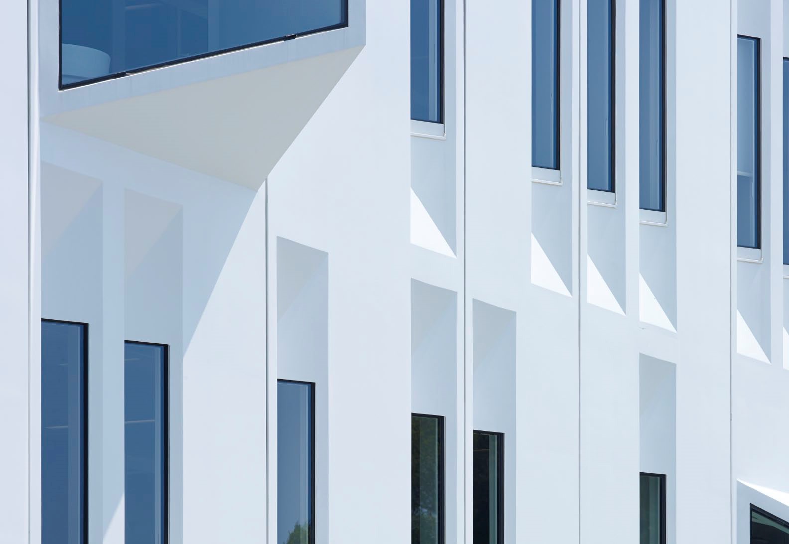Recladding work slows on social housing blocks | Construction News