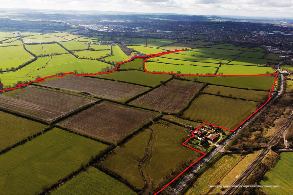 Developer secures site for 12,000-home development | Construction News