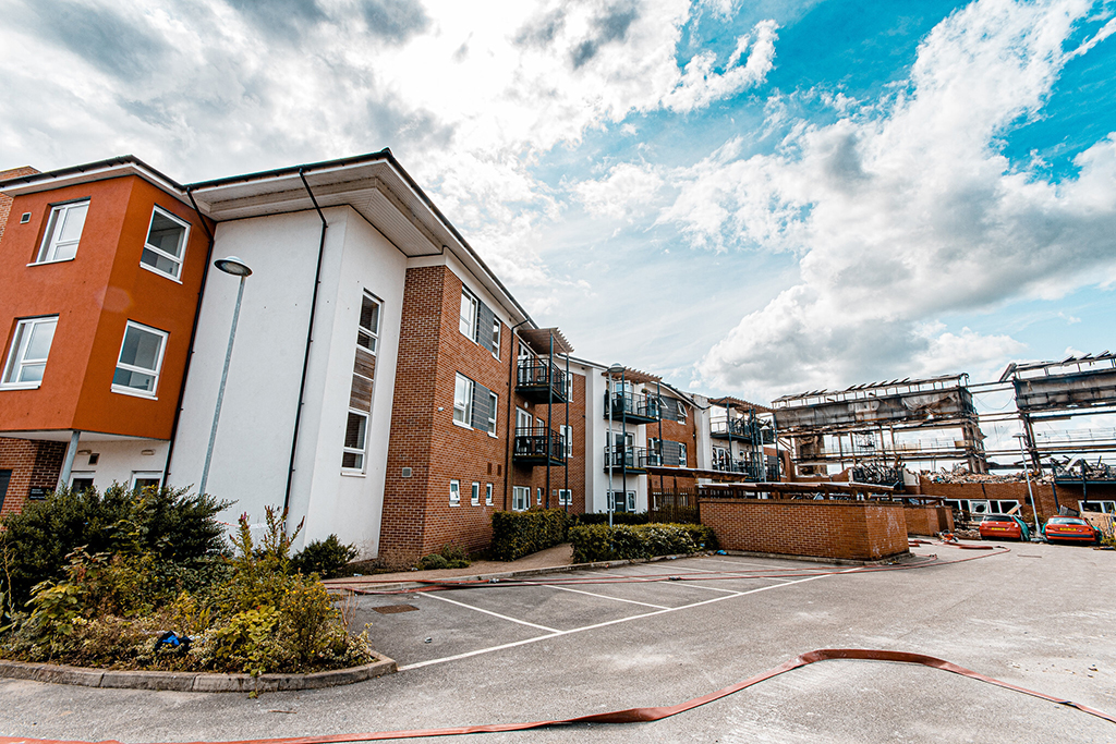 Council chases builders in £40m case over burnt retirement village ...