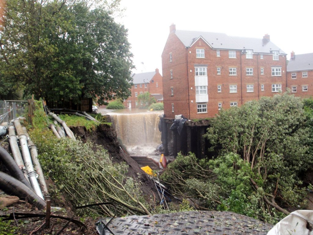 Culvert washout exposes piles under Newcastle flats | New Civil Engineer