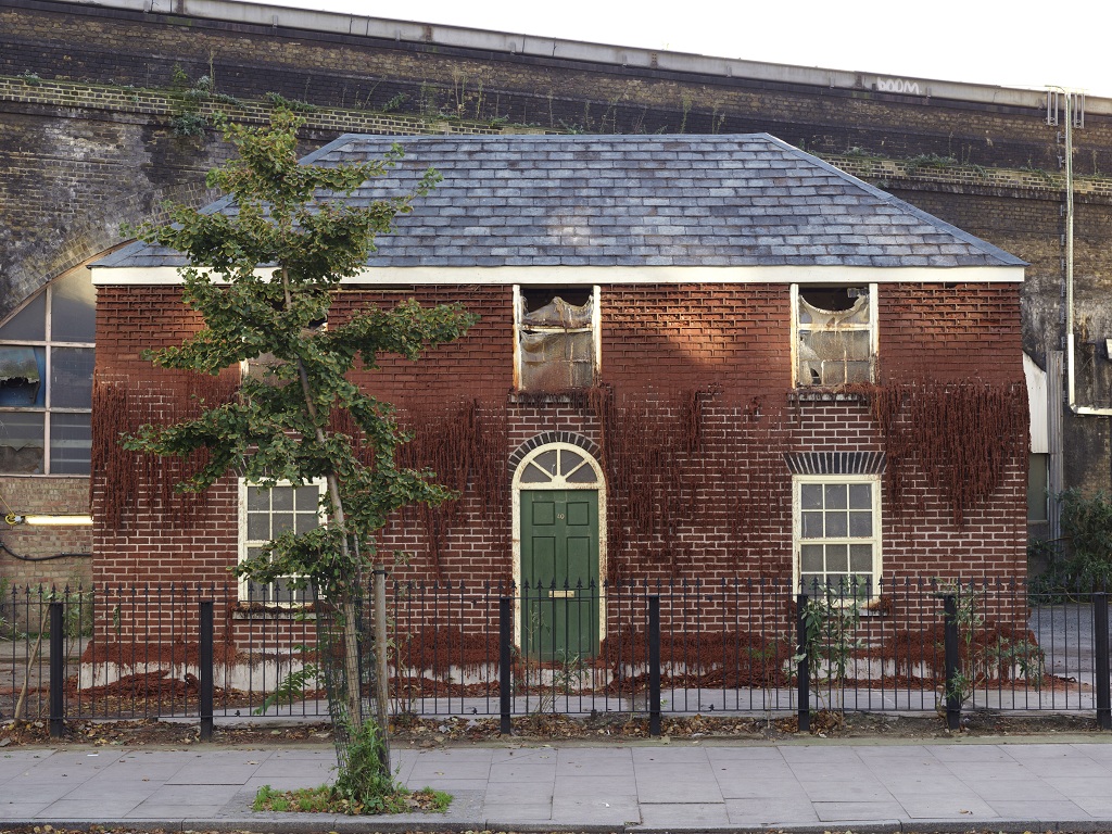 The structural challenges behind artist's 'melting house' installation ...