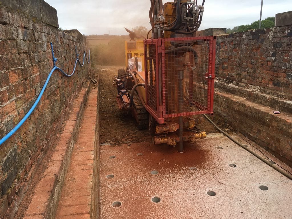 Masonry arch bridge lifted in world first | New Civil Engineer