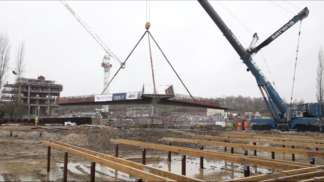 Three-legged bridge lifted into place in one piece | New Civil Engineer