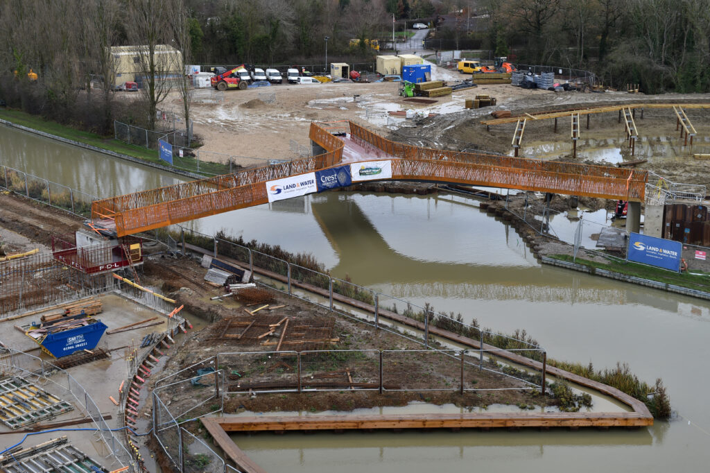 Three-legged bridge lifted into place in one piece | New Civil Engineer