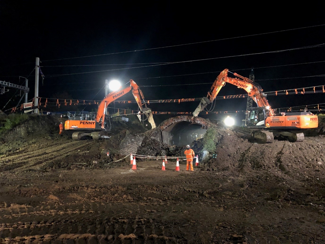 Rail line closed after 4,000t replacement bridge gets stuck in mud ...