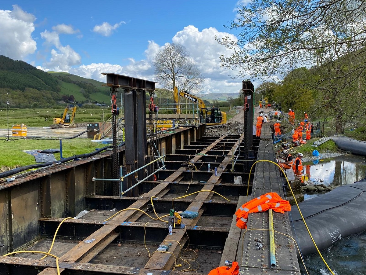 Watch: Engineers lift Welsh rail bridge out of flood zone | New Civil ...