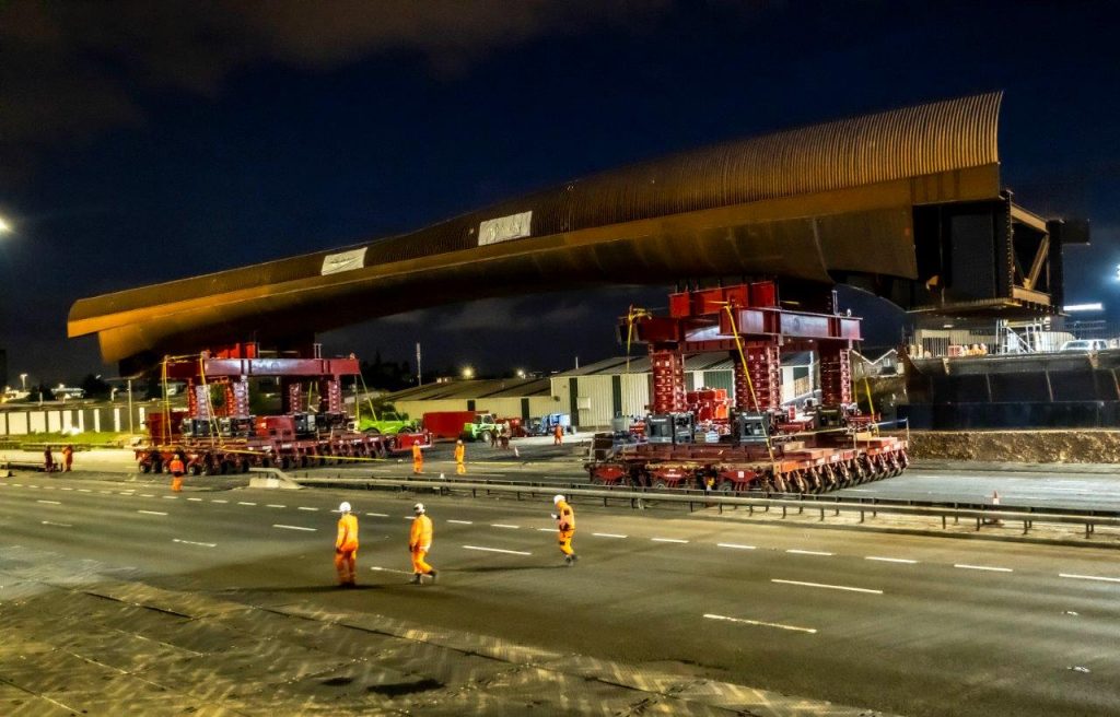 Bam Nuttall 'pirouettes' new footbridge over Scotland's M8 | New Civil ...