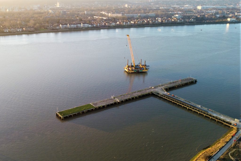 Pier construction ramps on the Thames to provide Barking Riverside with ...