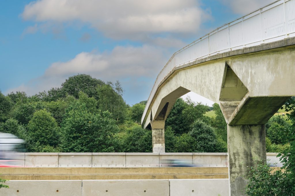 Road barrier world first delivered to protect 60-year-old M1 footbridge ...