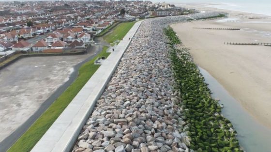 Balfour Beatty opens first section of £125M north Wales coastal defence ...