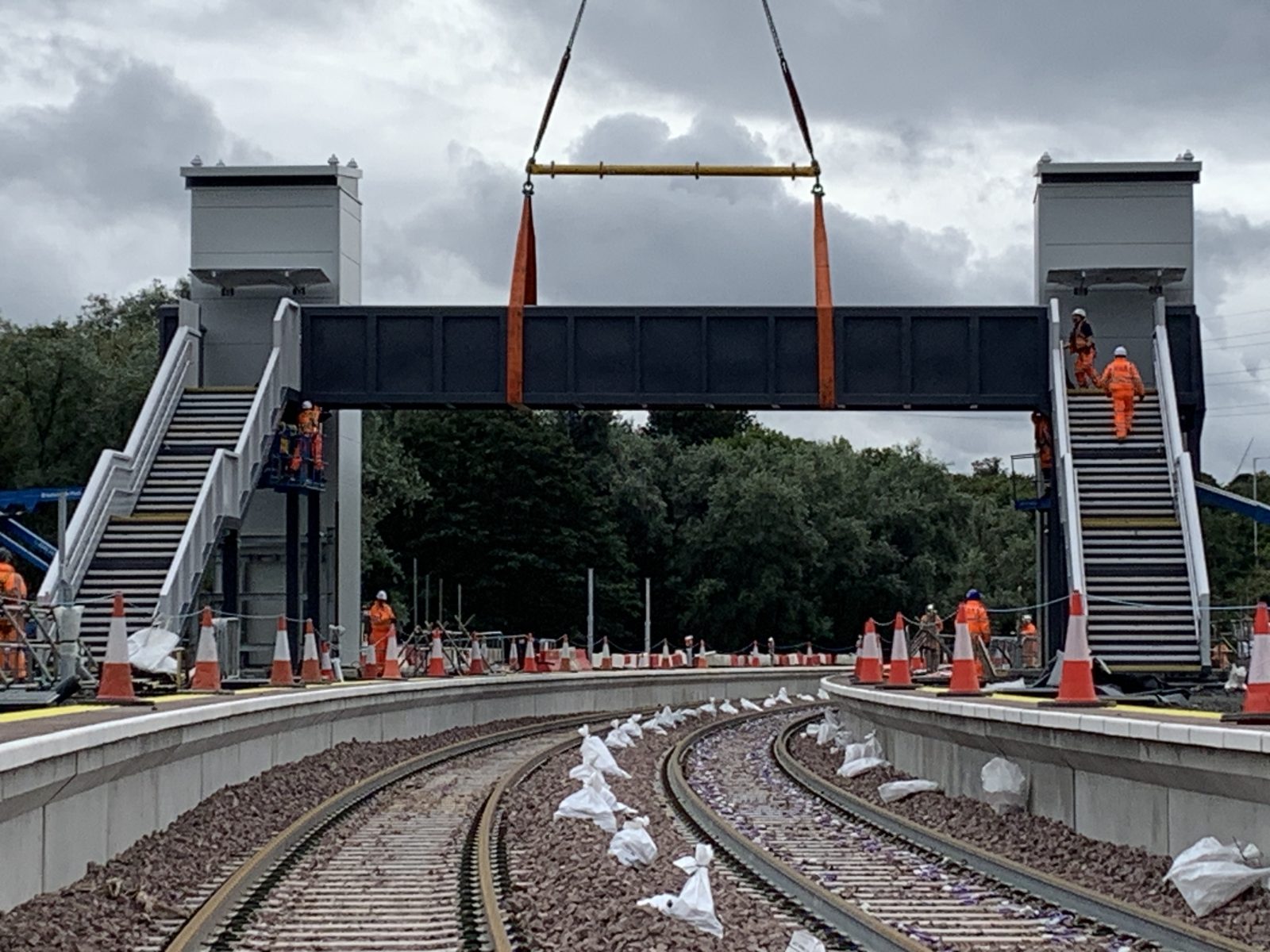 Footbridge lifted into place at Cameron station as part of £116M ...
