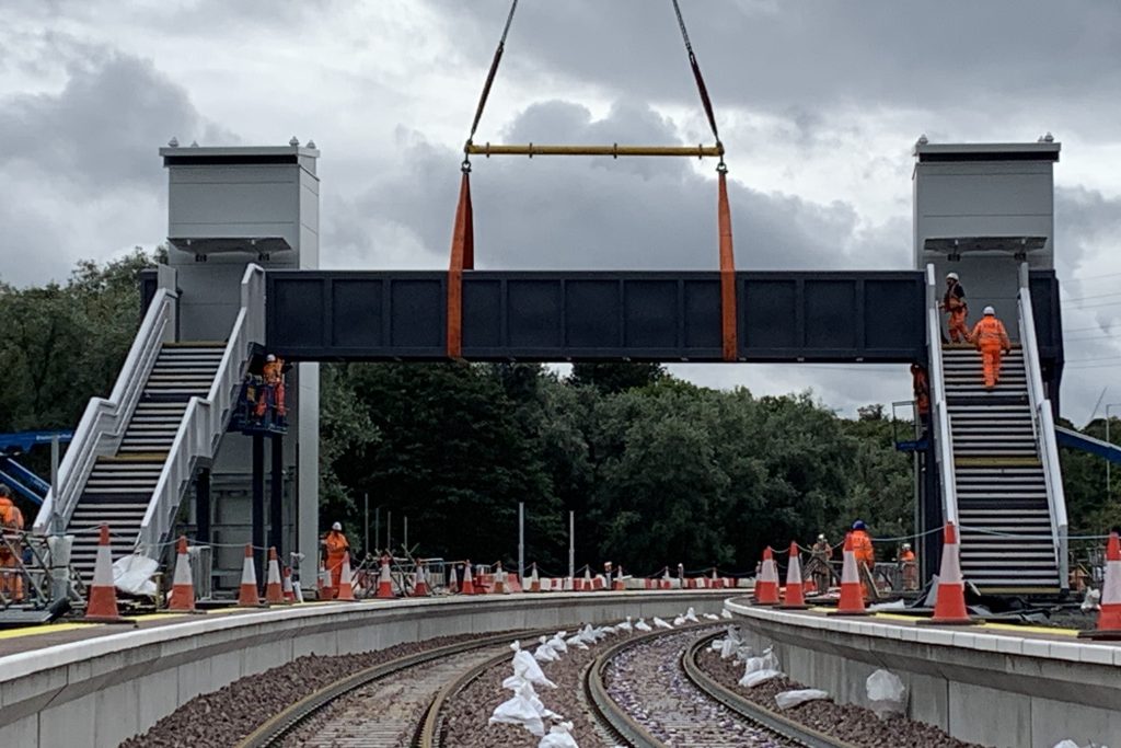 Footbridge lifted into place at Cameron station as part of £116M ...