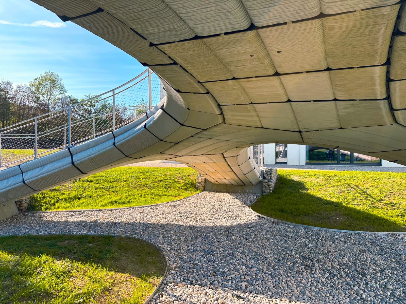 3D-printed concrete masonry bridge made of recycled materials revealed ...