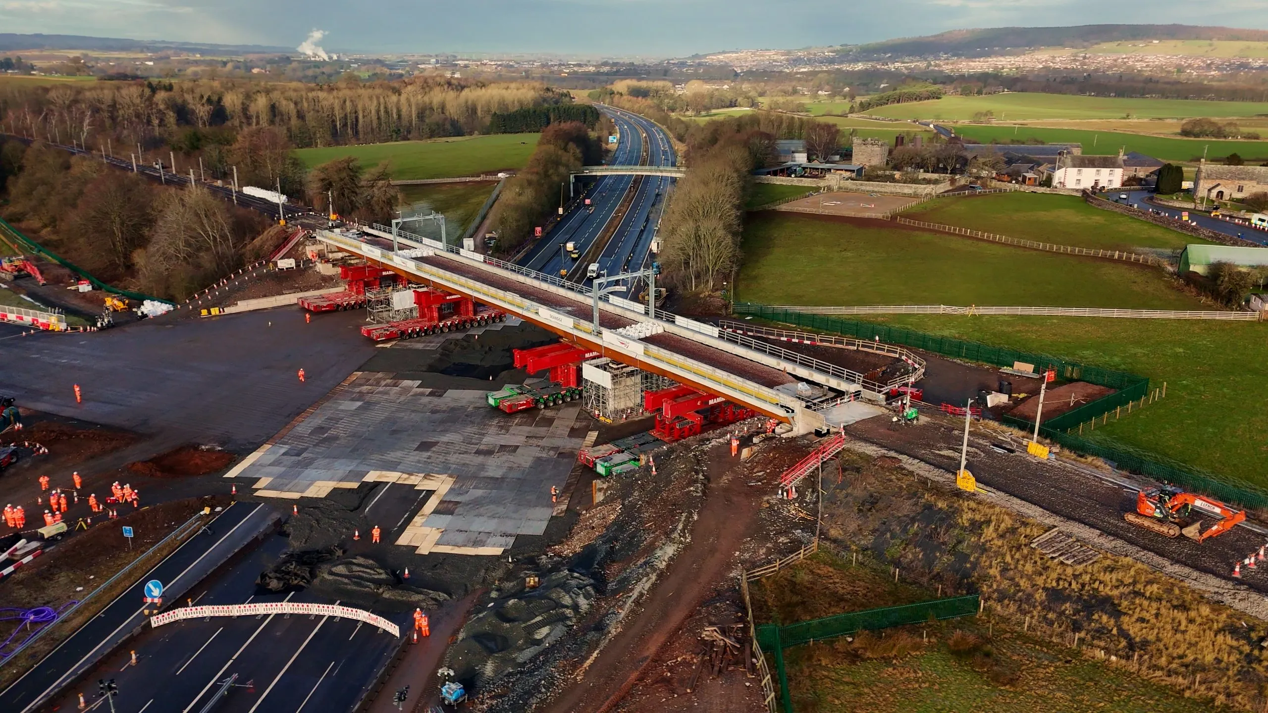 M6 opens 13 hours earlier than expected following 4,200t rail bridge ...